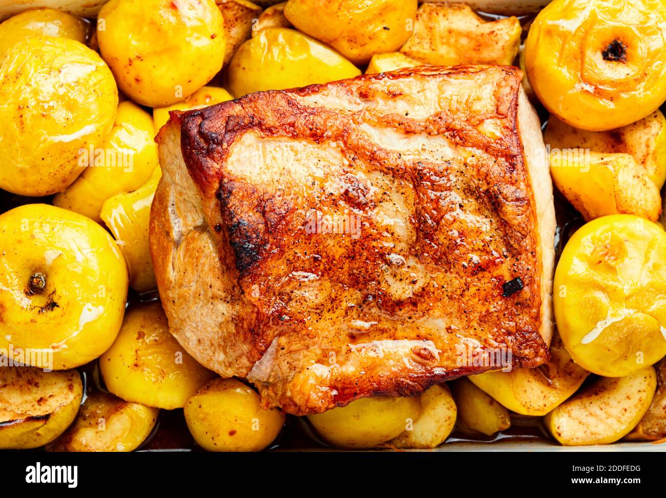 Baked meat with apples.Fried pork loin stuffed with apple Stock Photo ...