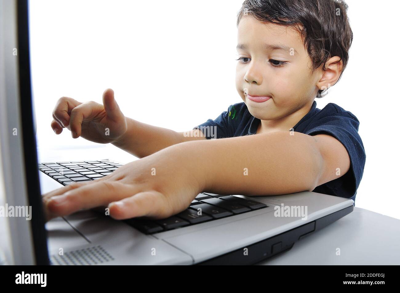 A little cute kid with a laptop isolated Stock Photo - Alamy