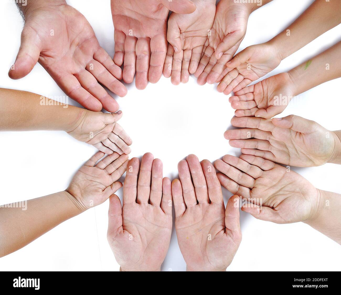 Many different sizes hands on isolated background Stock Photo - Alamy