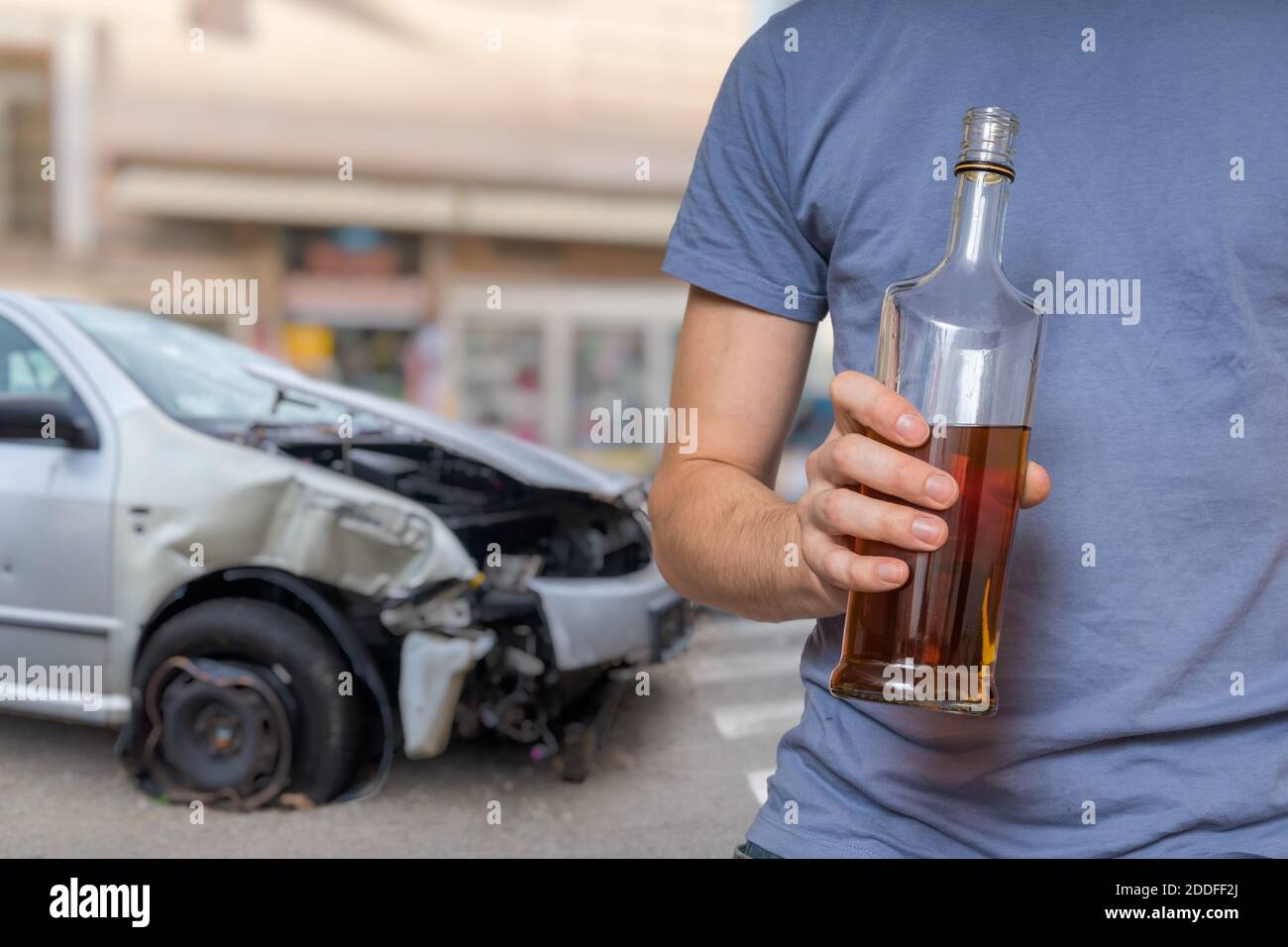Drunken driving car crash bottle hi-res stock photography and images ...