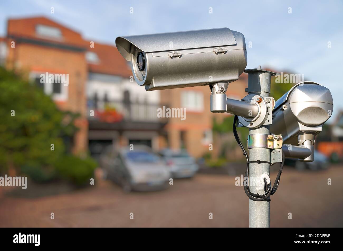 Security CCTV video camera monitoring home Stock Photo - Alamy