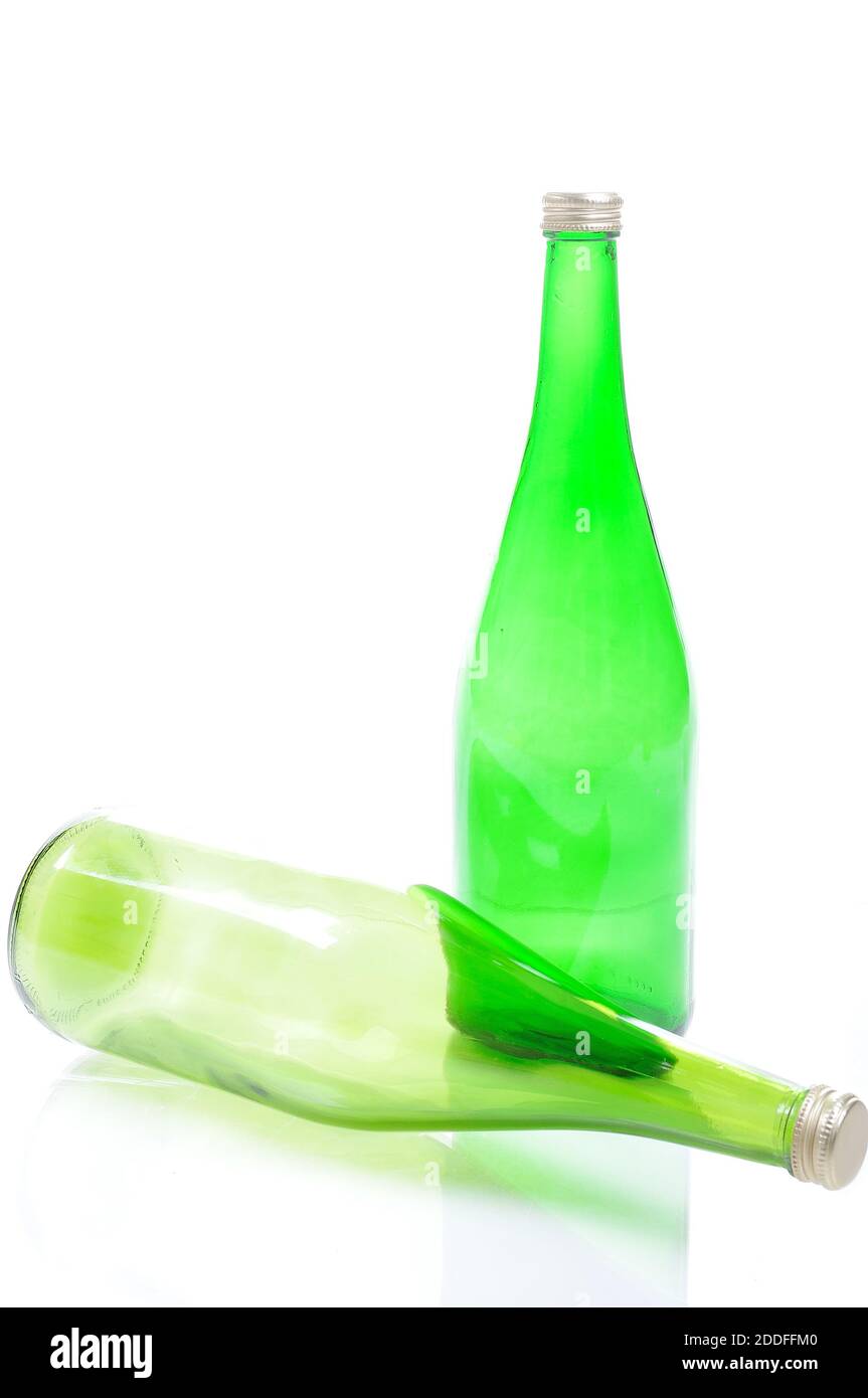 Two empty green bottles isolated Stock Photo - Alamy
