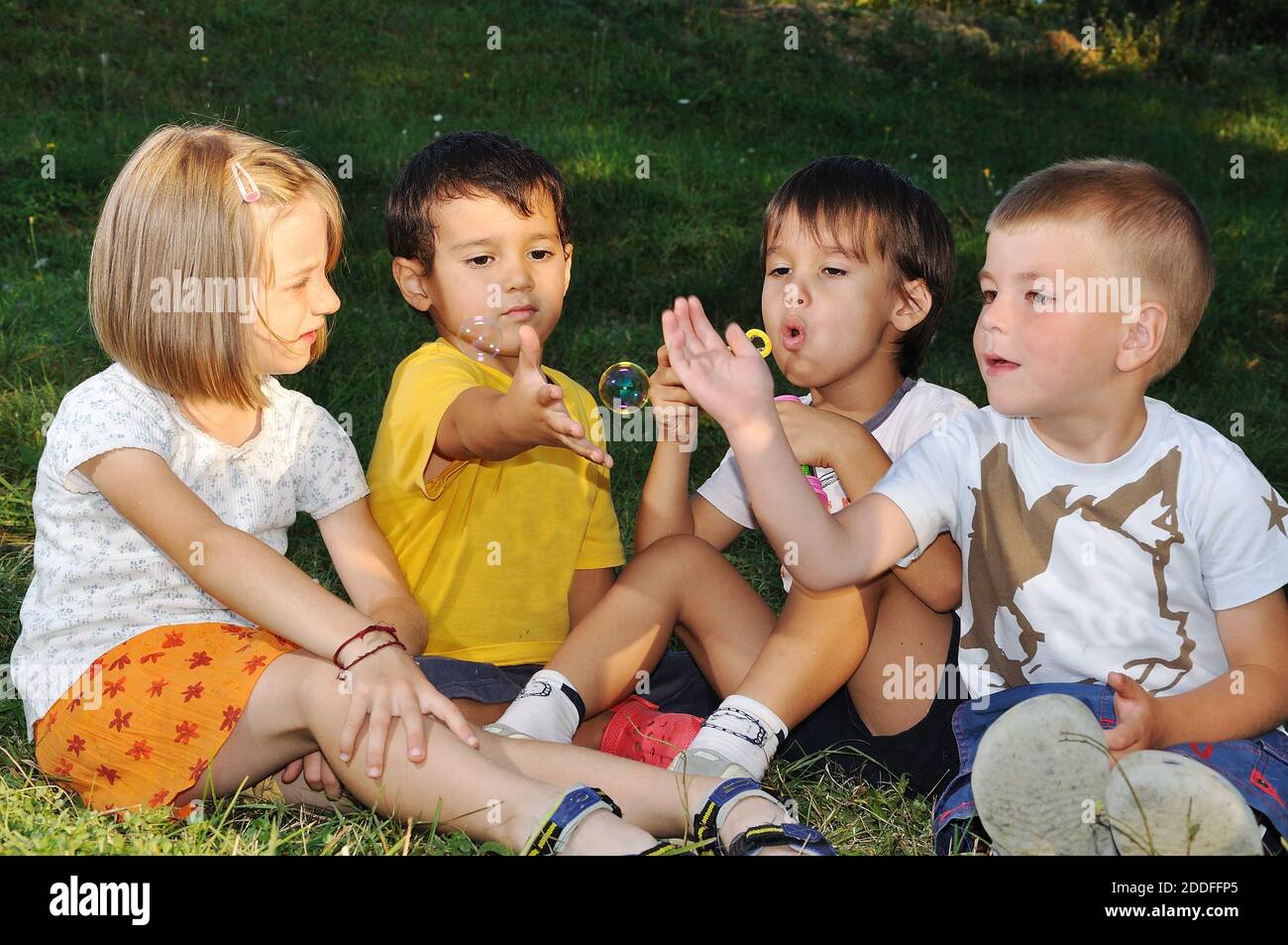 Tween group laugh hi-res stock photography and images - Alamy