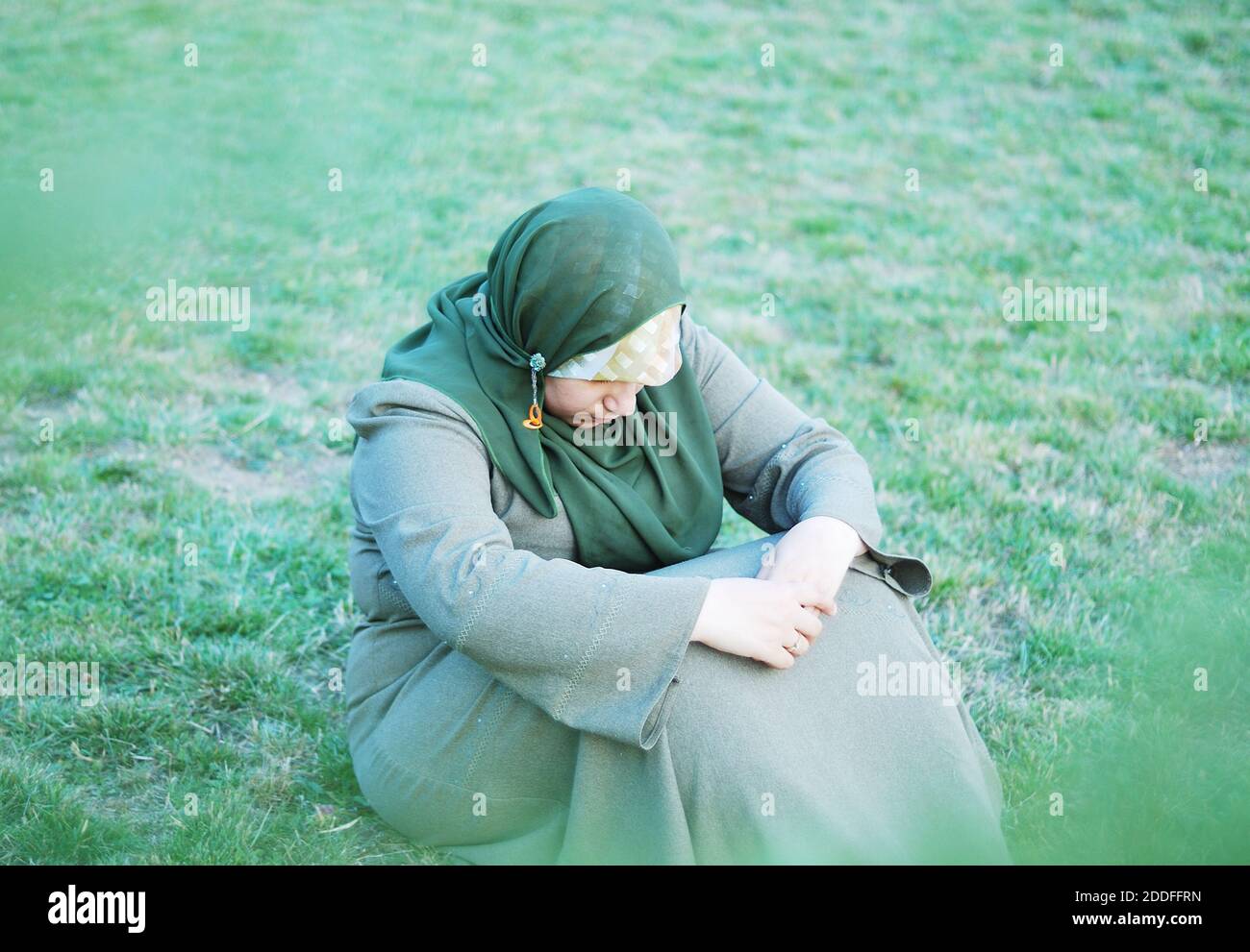 Muslim girl with sad eyes hi-res stock photography and images - Alamy