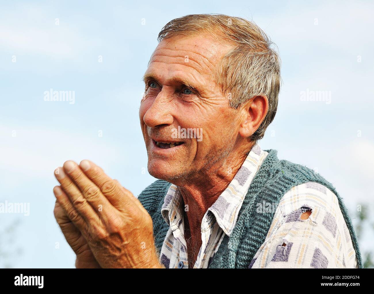 Middle aged male person with interesting gestures Stock Photo - Alamy