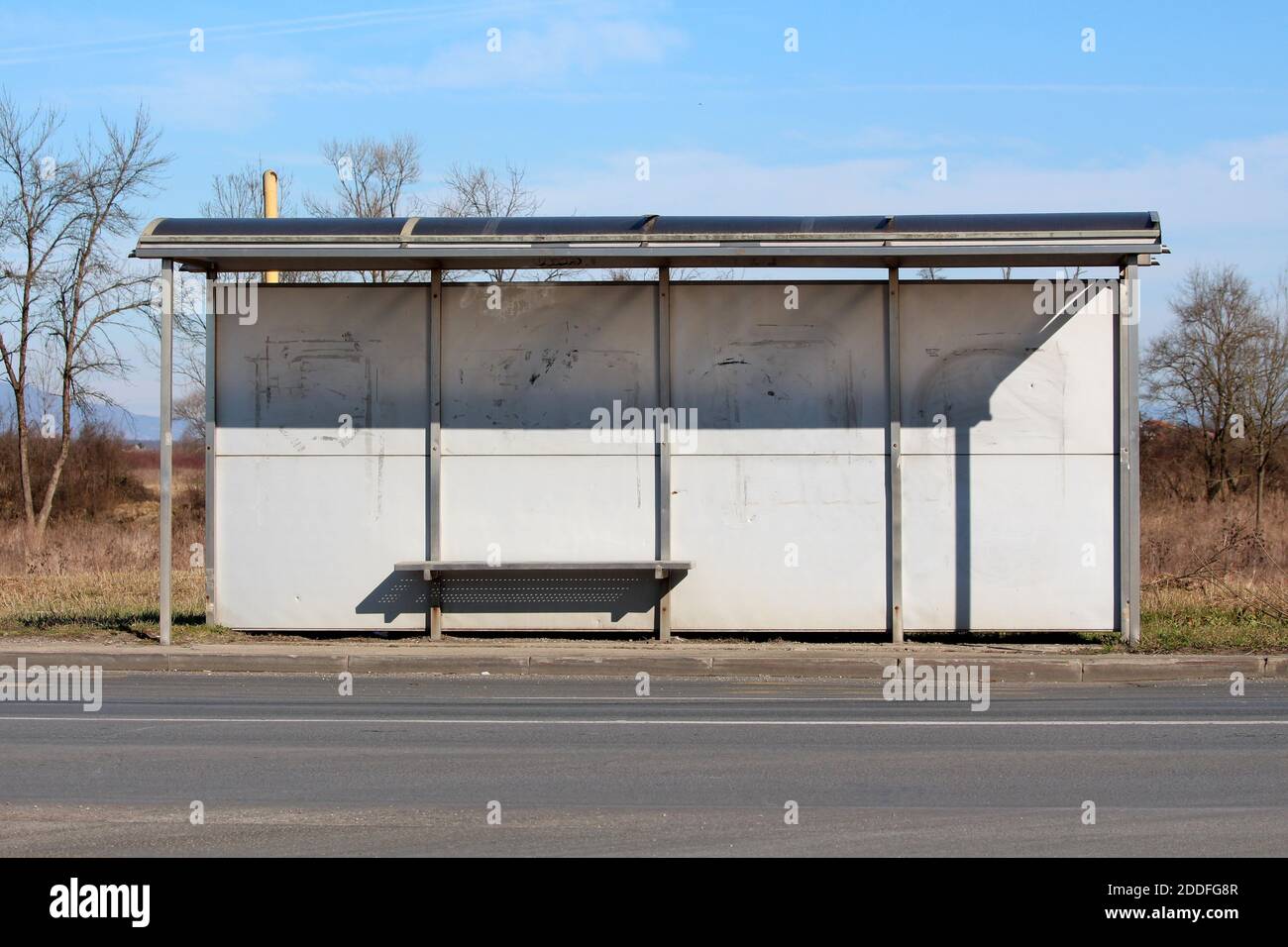 Front view of glass covered modern bus station supported with shiny ...