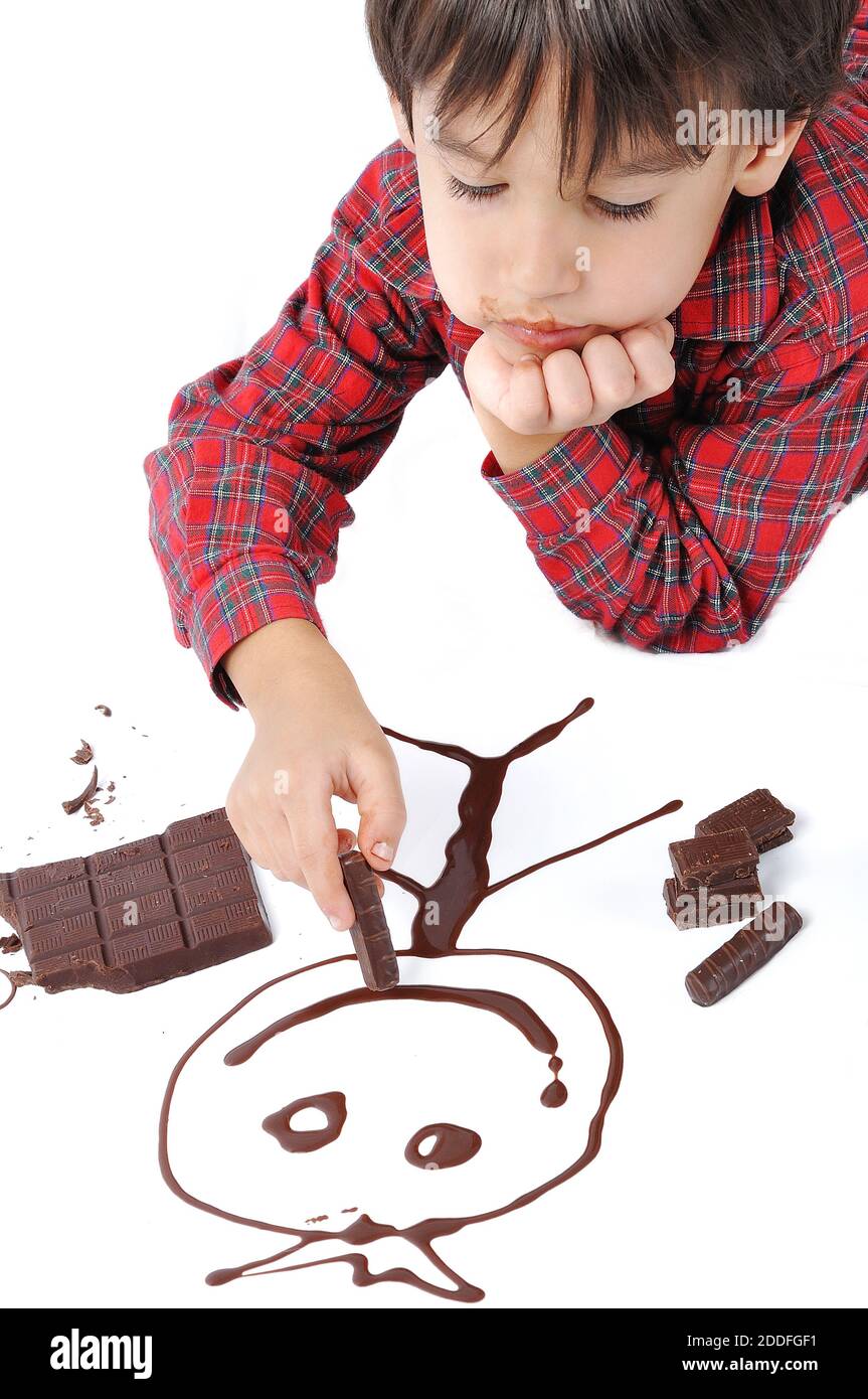 Writing and painting with chocolate Stock Photo - Alamy