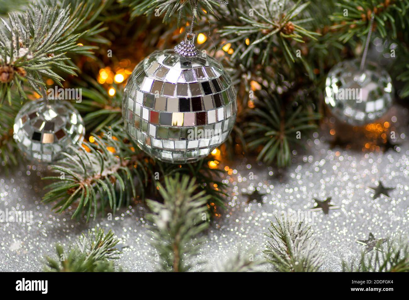 Shiny Christmas tree with ornaments and festive background Stock Photo ...