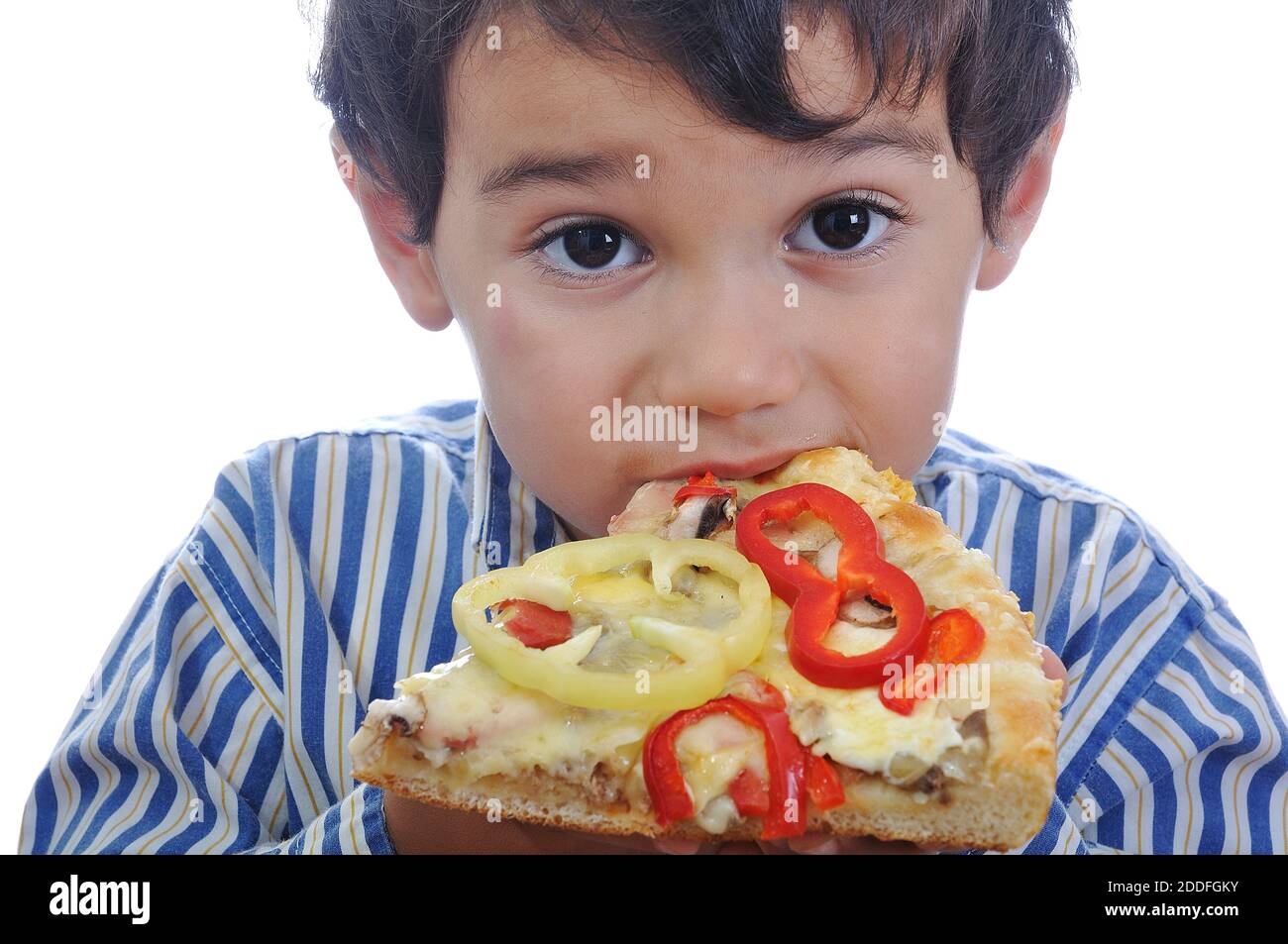 Cute little boy eating pizza, isolated Stock Photo - Alamy