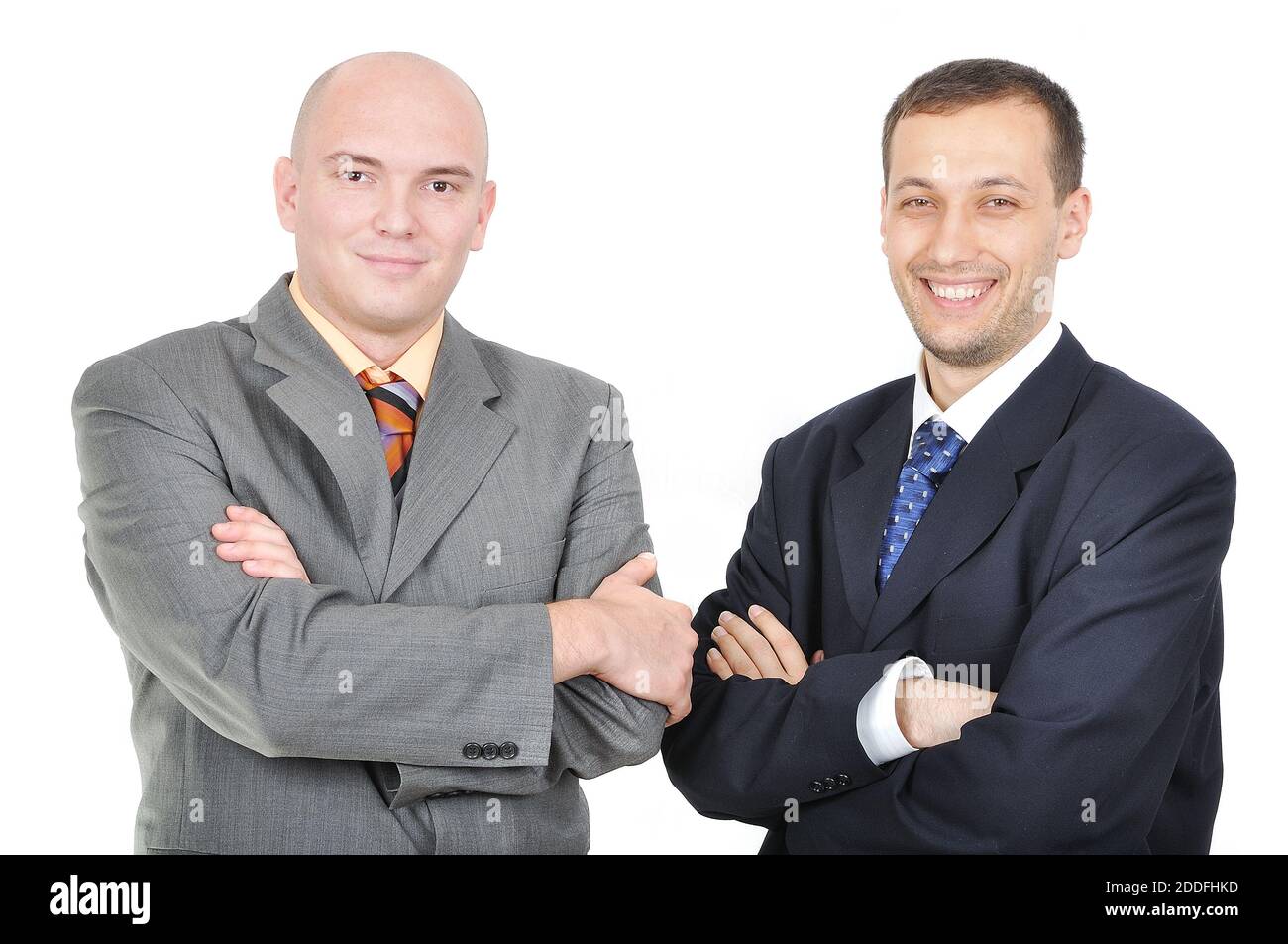 Group of young businessmen together on light background Stock Photo - Alamy