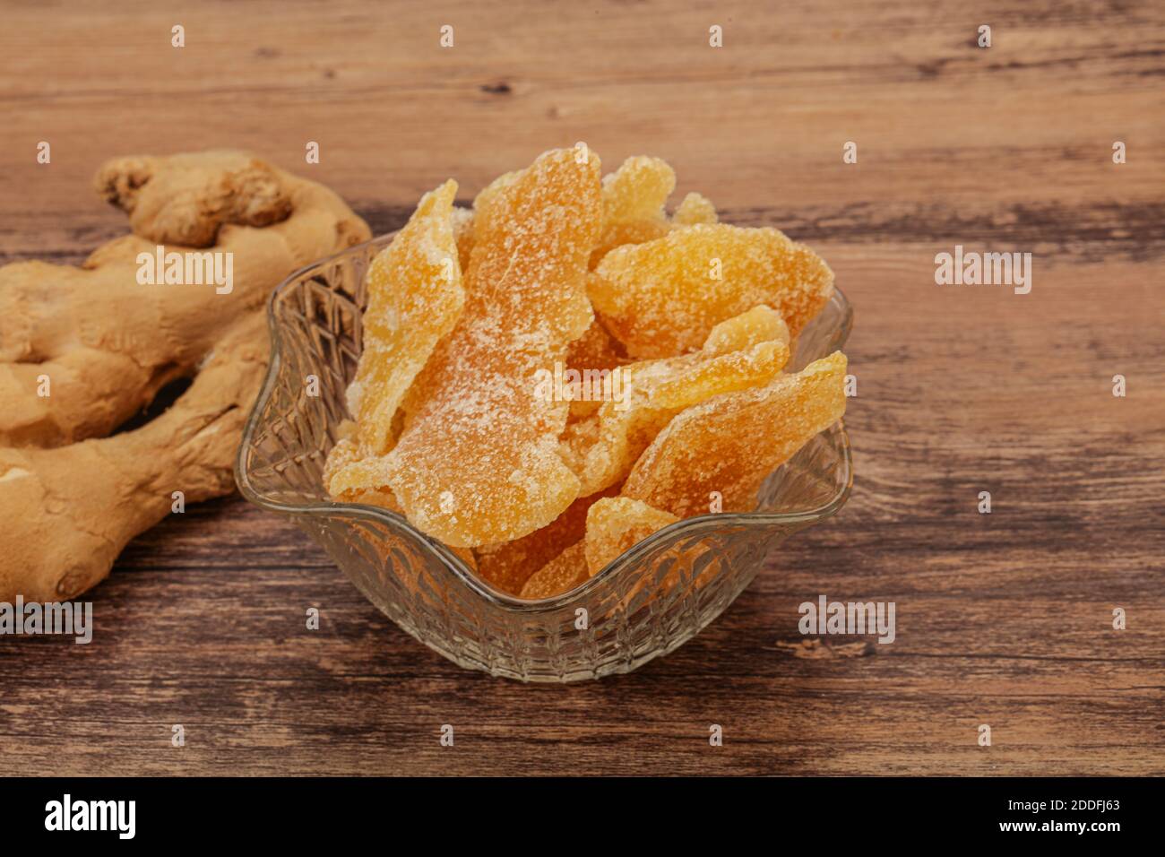 Dry sweet ginger snack in the bowl Stock Photo - Alamy