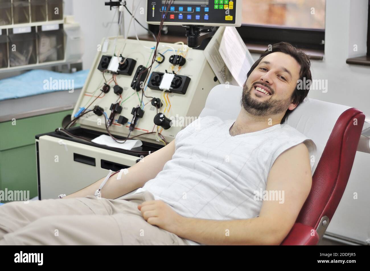 Young man in hospital on bed Stock Photo - Alamy