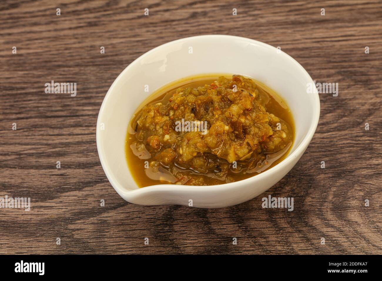 Green spicy sauce with pepper in the bowl Stock Photo - Alamy