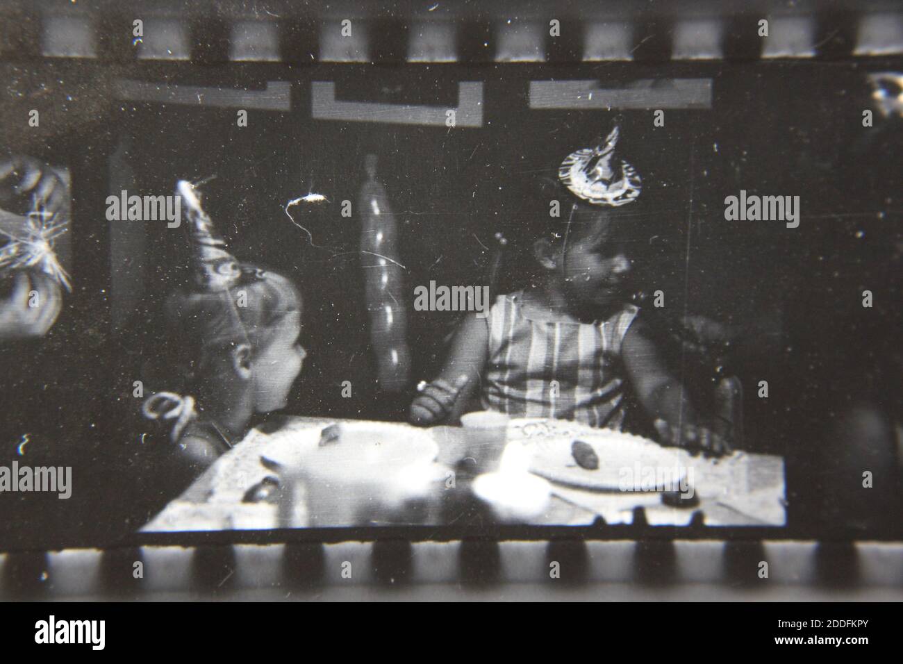 Fine 1970s vintage black and white photography of two girls enjoying a ...