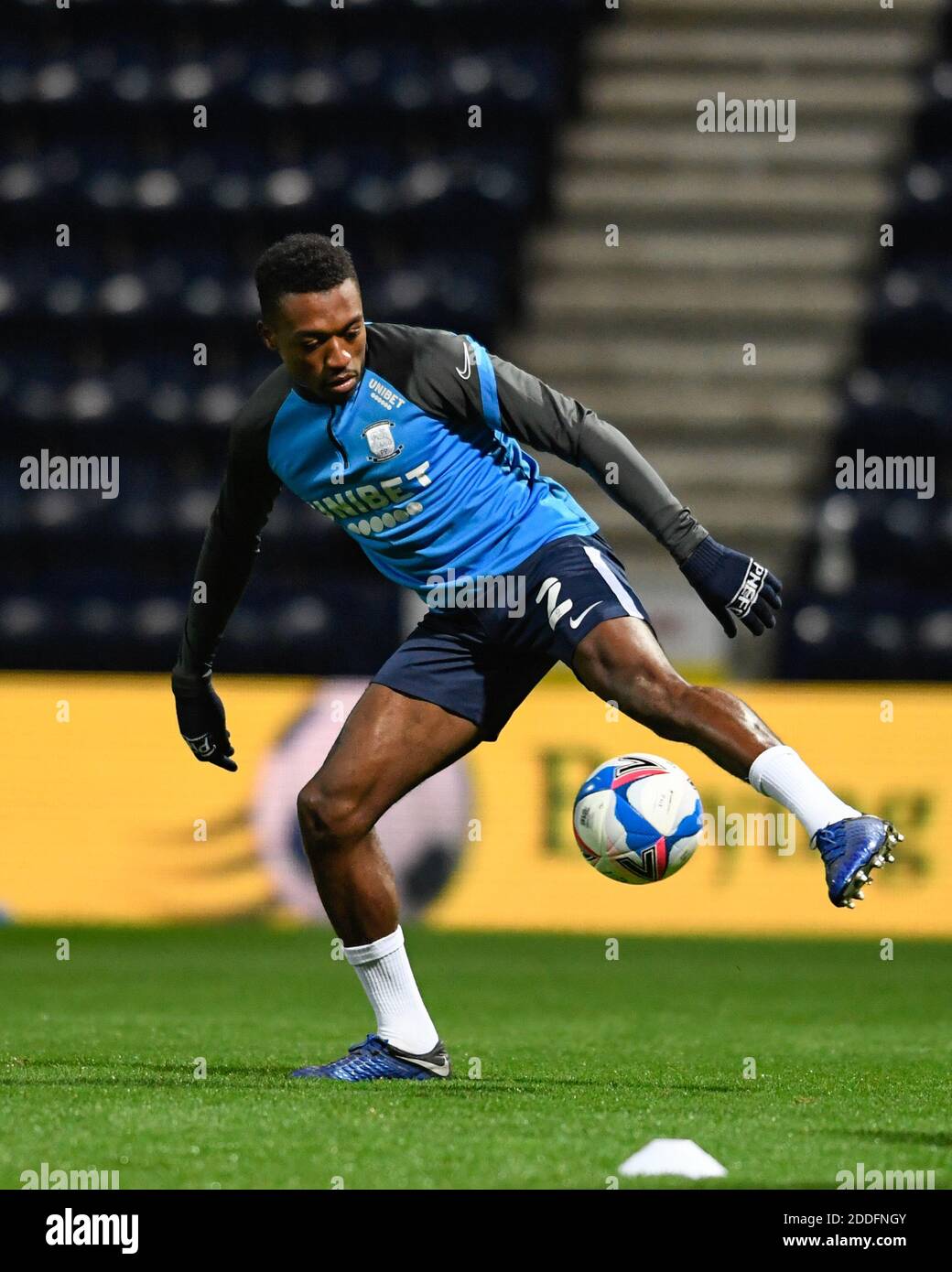 Darnell Fisher #2 of Preston North End controls the ball in the warm up ...