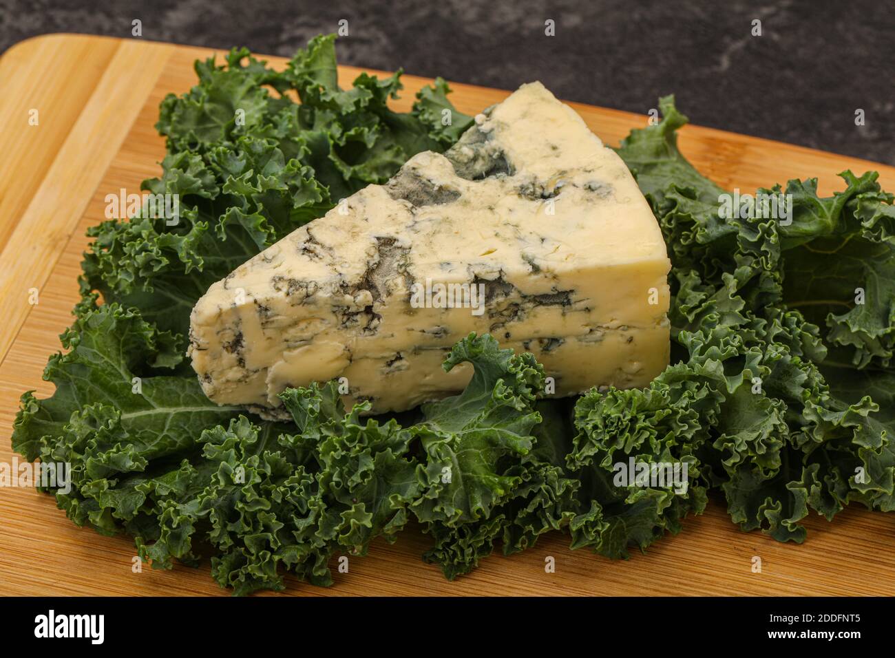 Dairy Blue cheese triangle with mold Stock Photo - Alamy