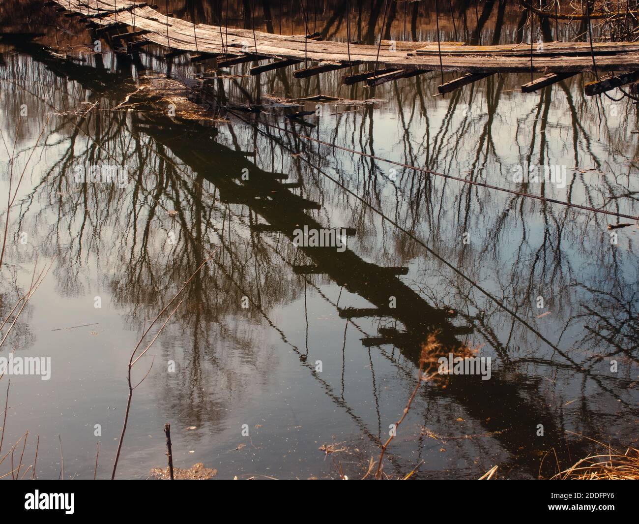 old broken bridge over the river, Russia Stock Photo - Alamy
