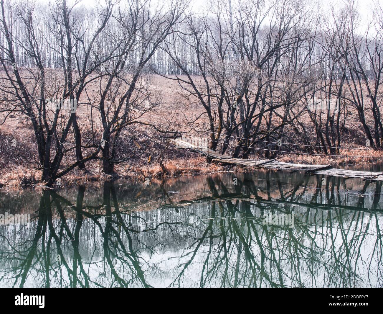 Plank bridge over river hi-res stock photography and images - Alamy