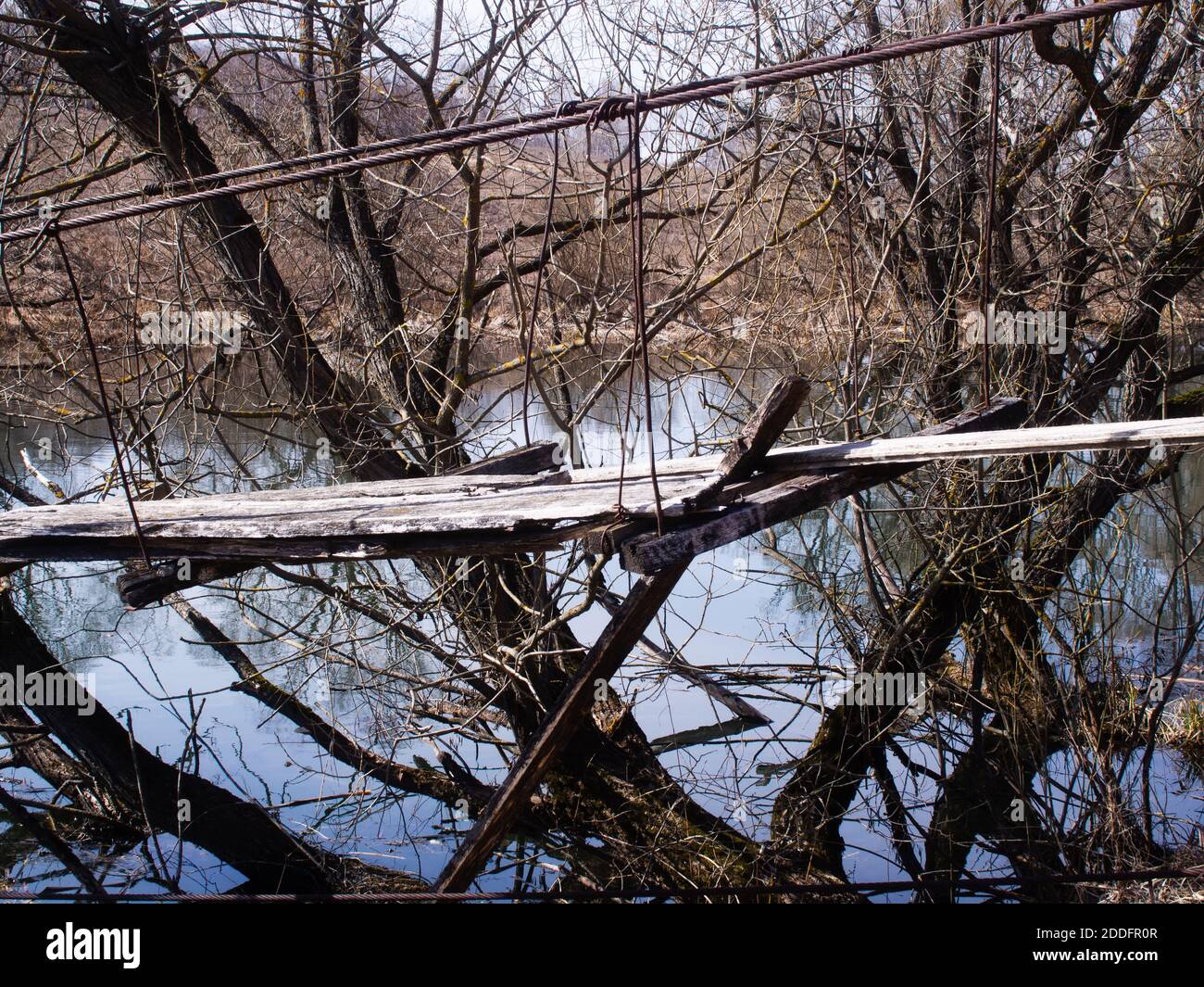 old broken bridge over the river, Russia Stock Photo - Alamy