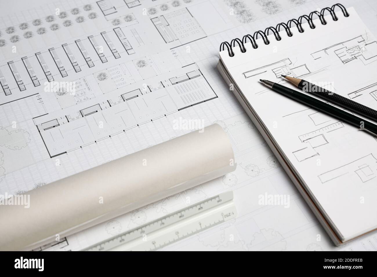 Architect scale ruler, pencil, mechanical pencil, notebook and building ...