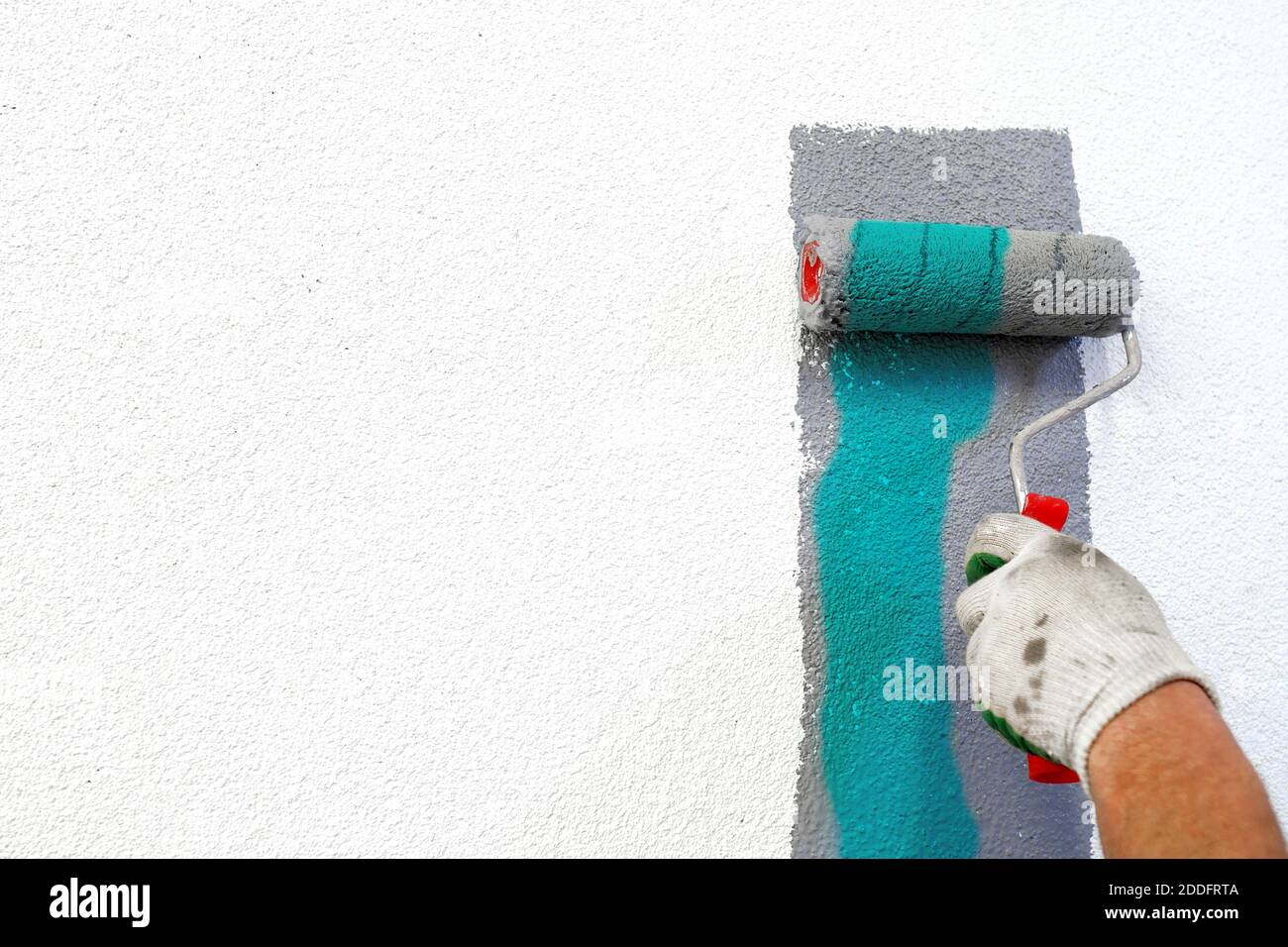 Hand painting wall paint hi-res stock photography and images - Alamy