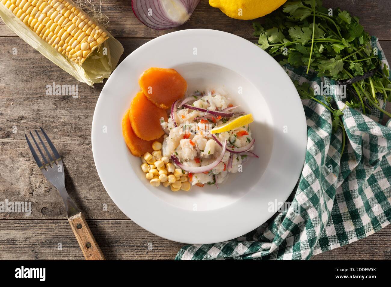 Traditional peruvian ceviche with fish, sweet potato, corn and ...