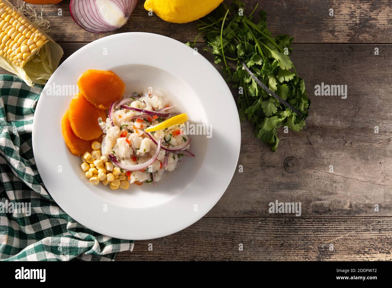 Traditional peruvian ceviche with fish, sweet potato, corn and ...