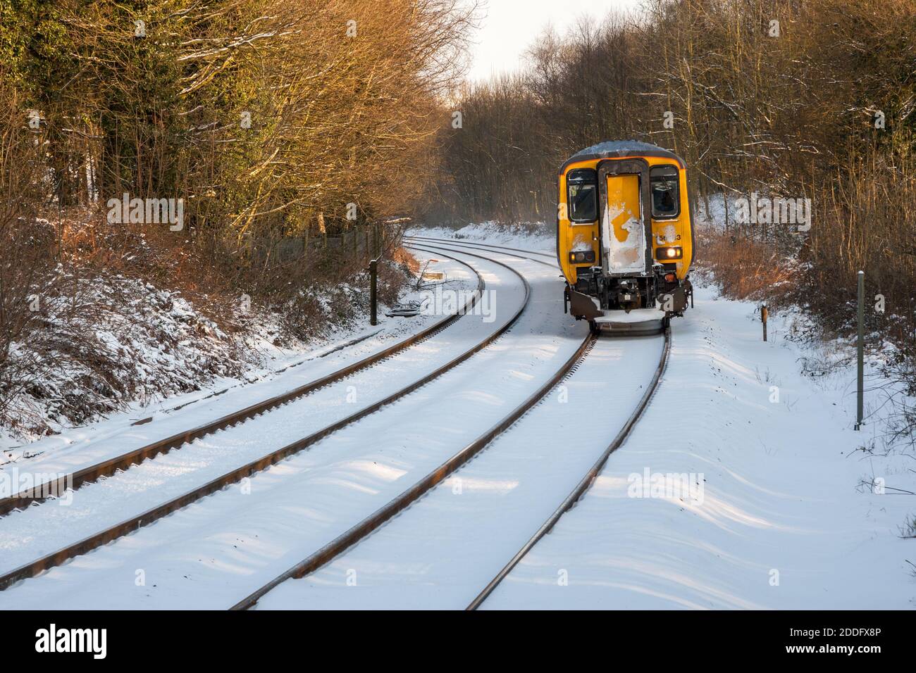 Train on the snow covered Manchester to Buxton railway line Stock Photo ...