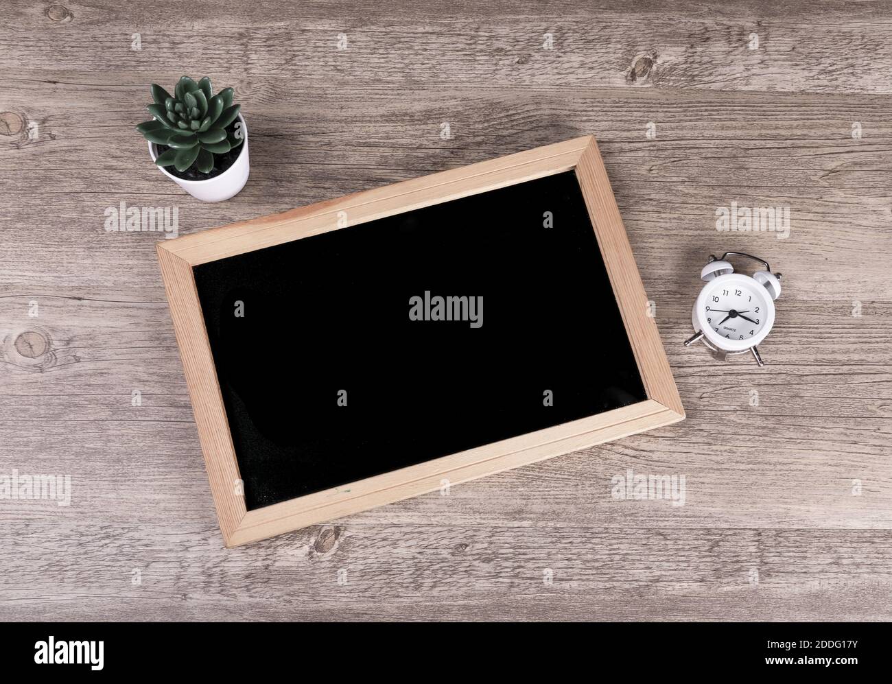 A top view of a black empty chalkboard on an office desk Stock Photo ...