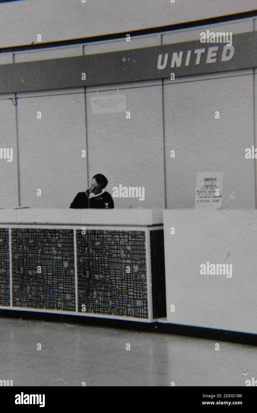 Fine 1970s vintage black and white photography of a regular guy manning ...