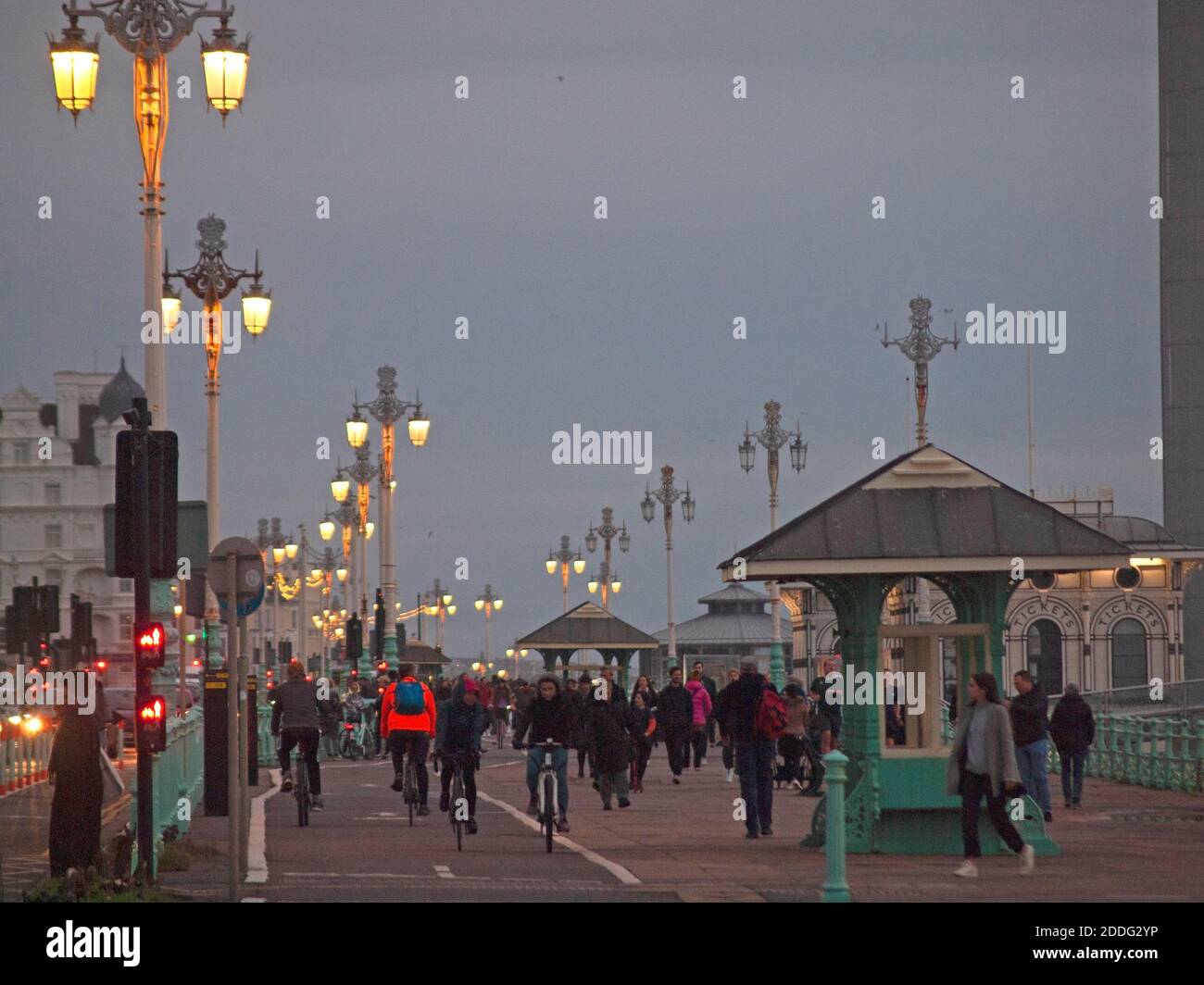 A busy evening on the promenade above Brighton beach Stock Photo - Alamy