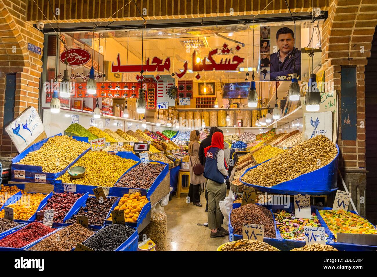Grand traditional bazaar with background of buyers in Tehran, Iran ...