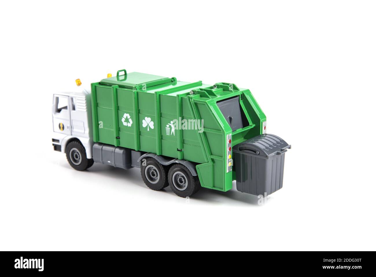 A green toy truck on white background Stock Photo - Alamy