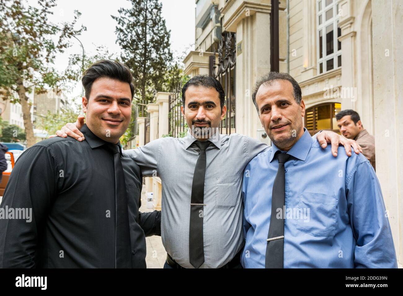 Portrait of three Iranian men for celebrating birthday at home in ...