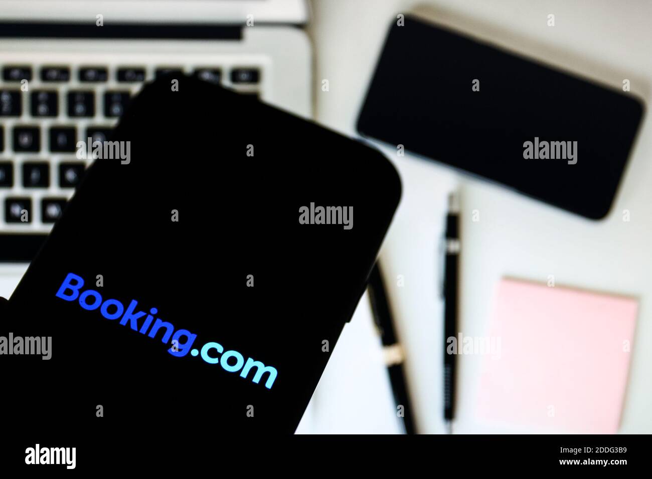 In this photo illustration a Booking.com company logo seen displayed on ...