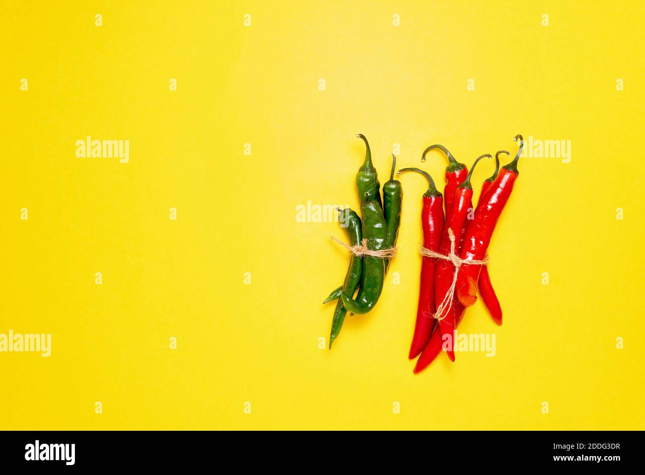 chili pepper on a yellow background with space for copying text. flat ...
