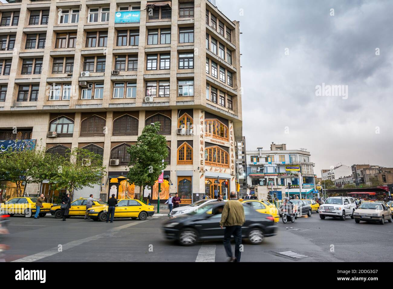 Street view of the Ferdowsi street in Tehran, which is famous for money ...