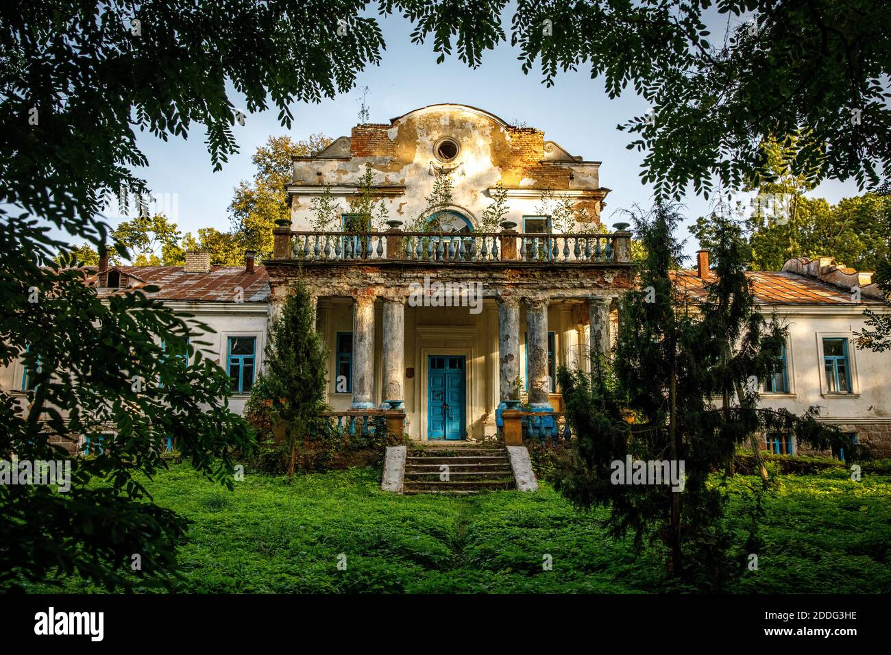 Old abandoned manor in the forest. Ruined house in nature Stock Photo ...