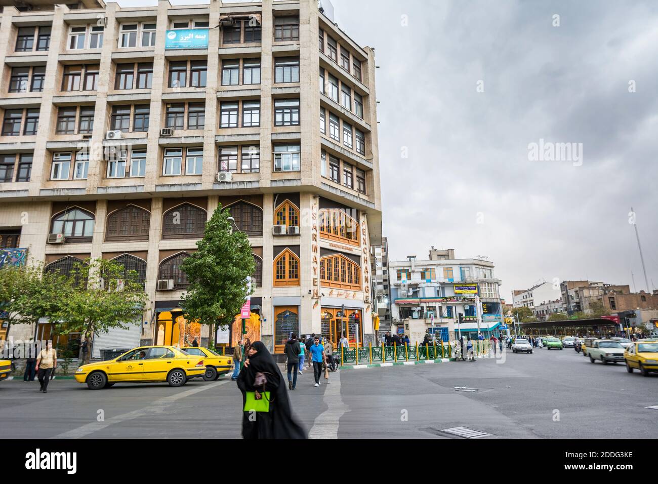 Street view of the Ferdowsi street in Tehran, which is famous for money ...