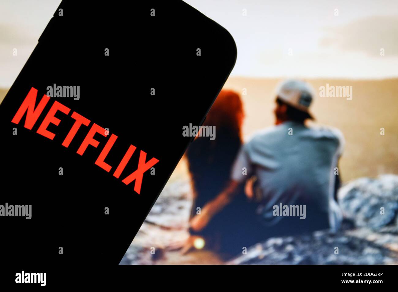 In this photo illustration a red Netflix content platform logo seen ...