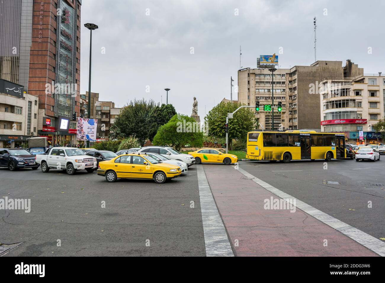 Street view of Ferdowsi street in Tehran, which is famous for money ...