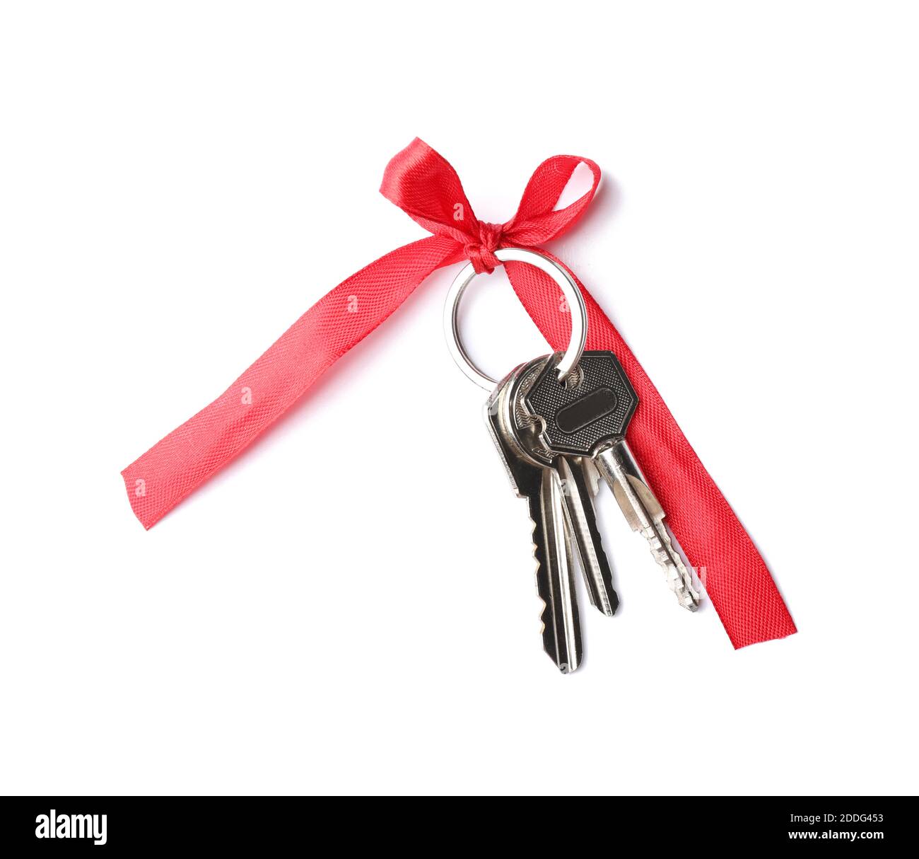 Keys with bow on white background Stock Photo - Alamy