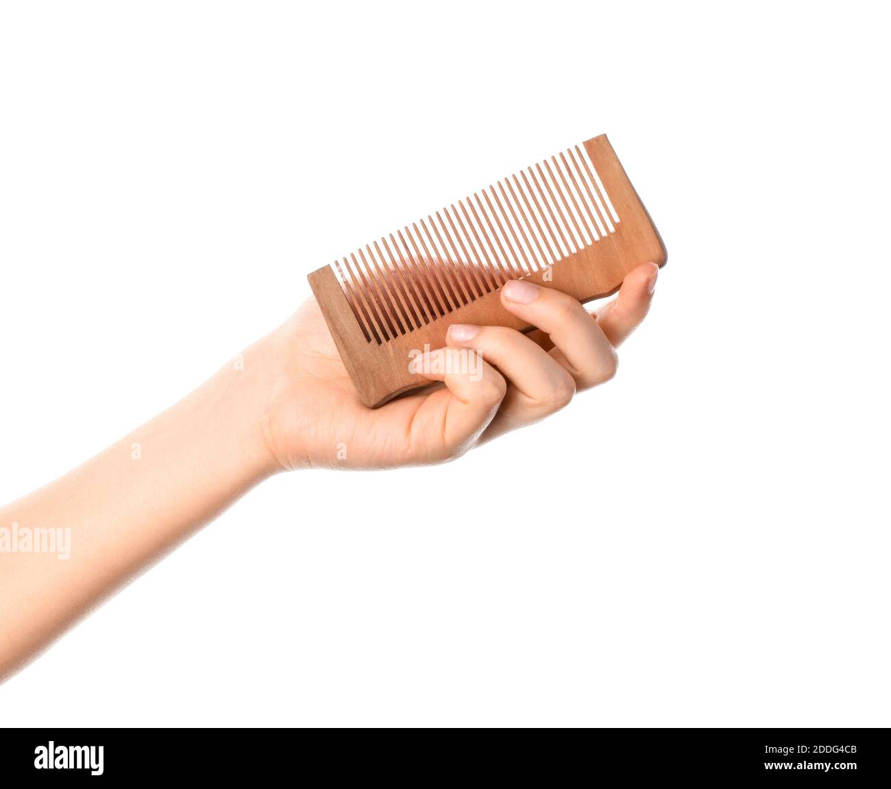 Woman hand and hair comb on white background Stock Photo - Alamy