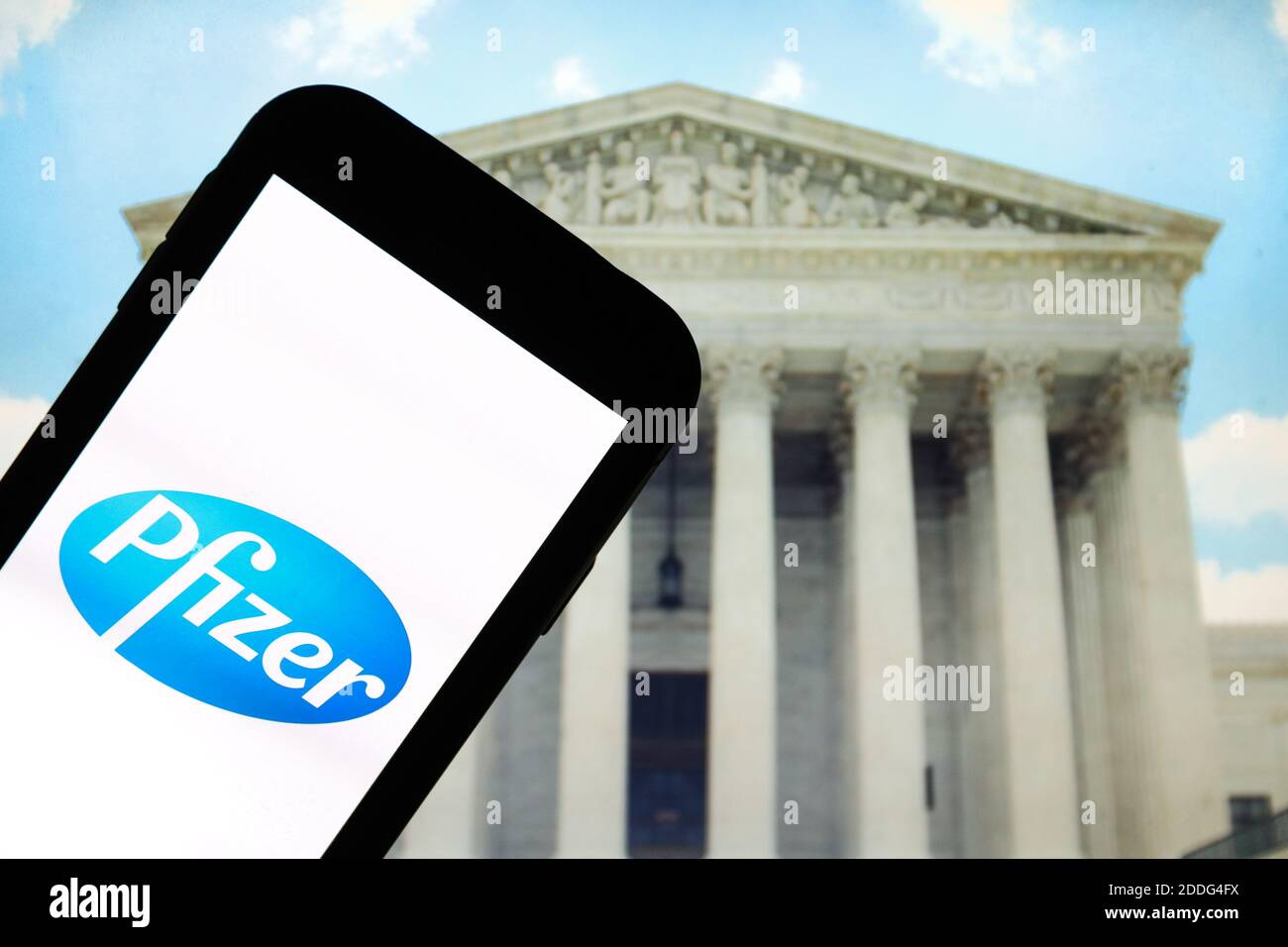 In this photo illustration a Pfizer pharmaceutical company logo seen ...