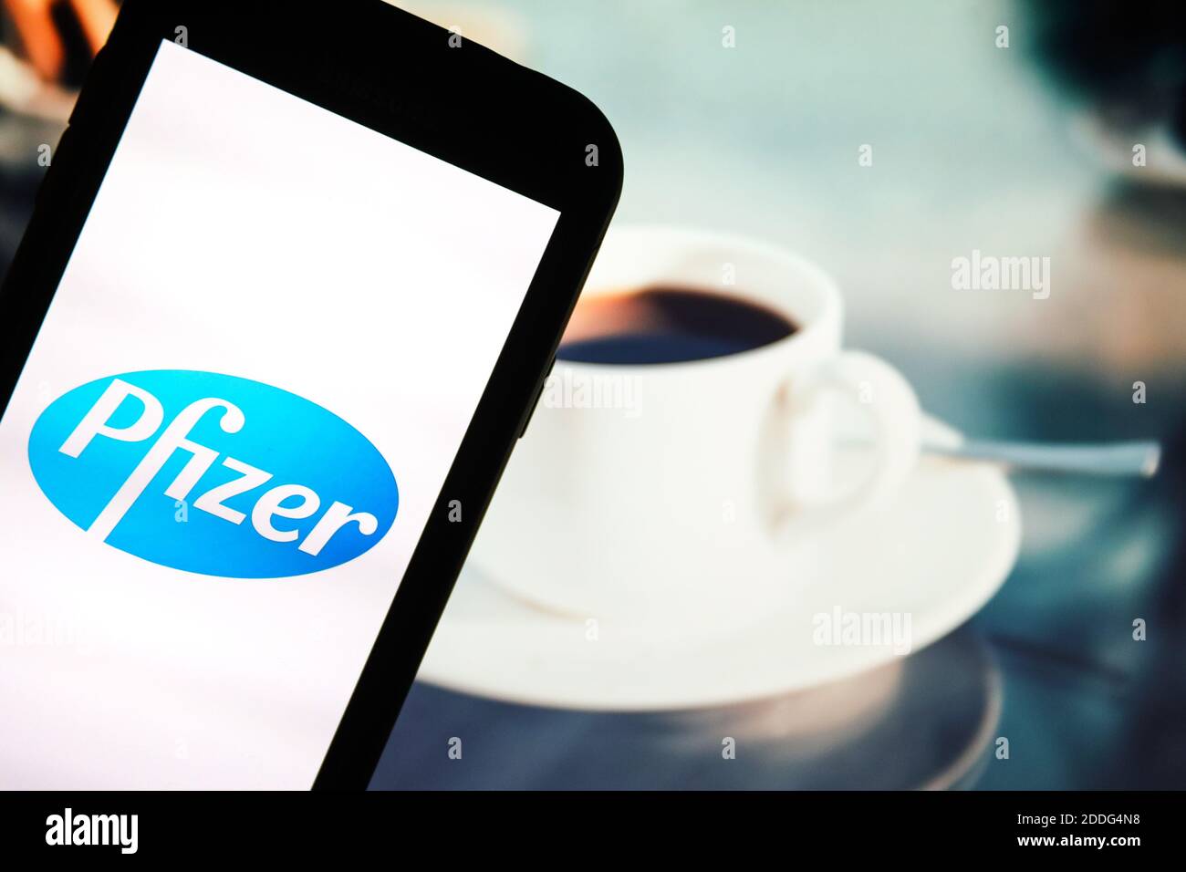 In this photo illustration a Pfizer pharmaceutical company logo seen ...