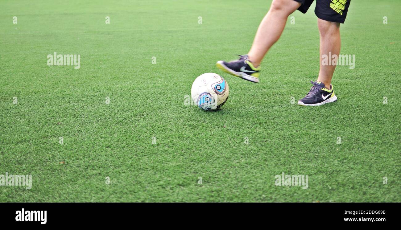 Kicking A Ball High Resolution Stock Photography and Images - Alamy
