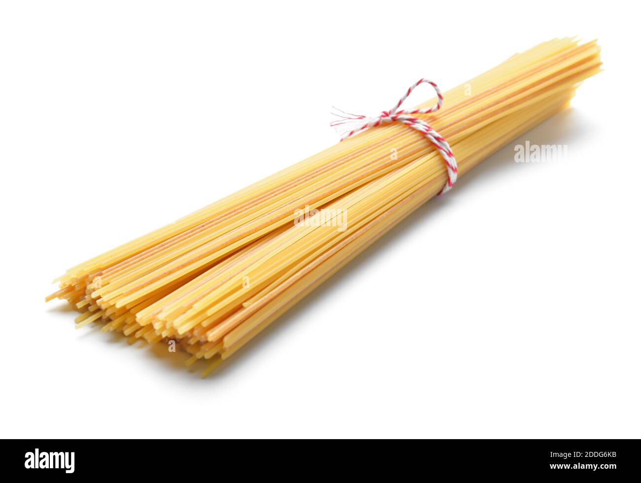 Uncooked spaghetti on white background Stock Photo - Alamy