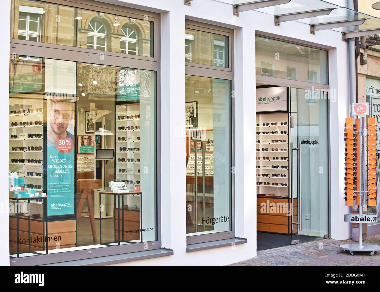 Side view of a window store on the shopping street in the city center ...