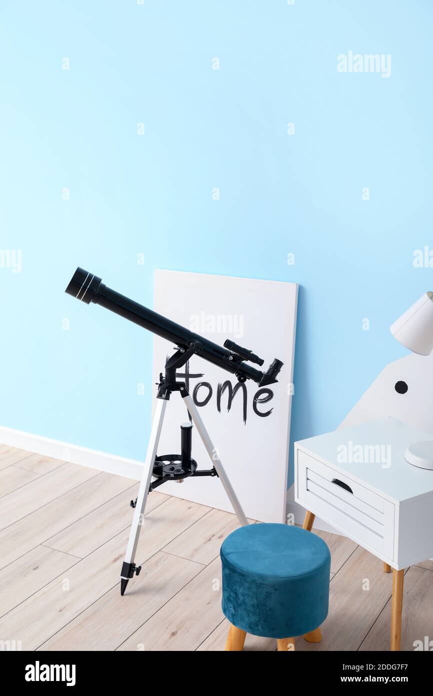 Interior of modern room with telescope Stock Photo - Alamy