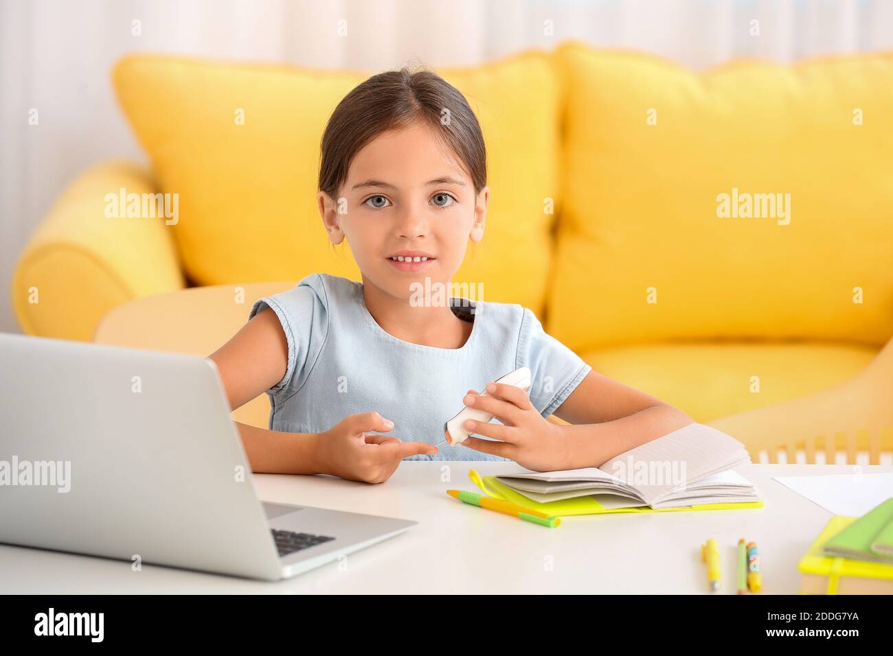 Little diabetic girl checking blood sugar level at home Stock Photo - Alamy